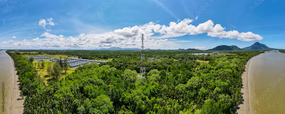 4g and 5g cellular telecommunication towers with panoramic landscape ...
