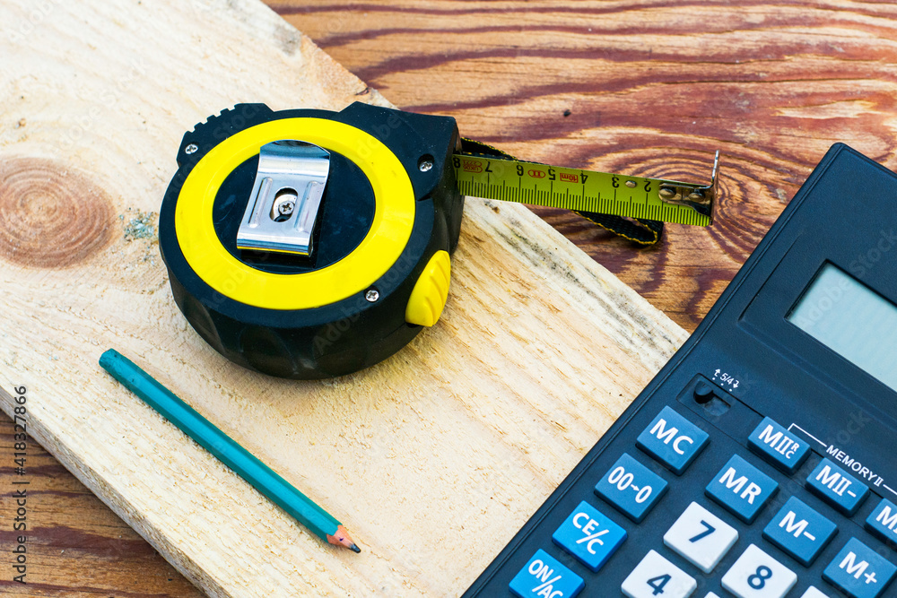 construction meter-tape measure calculator for calculations pencil and ...
