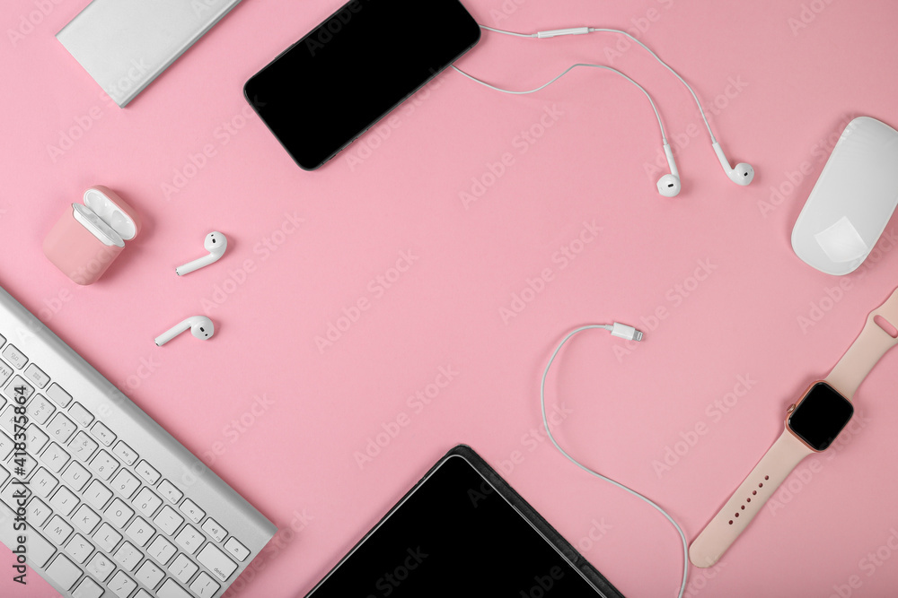 Mockup of smart gadgets on the background of office items on pink ...