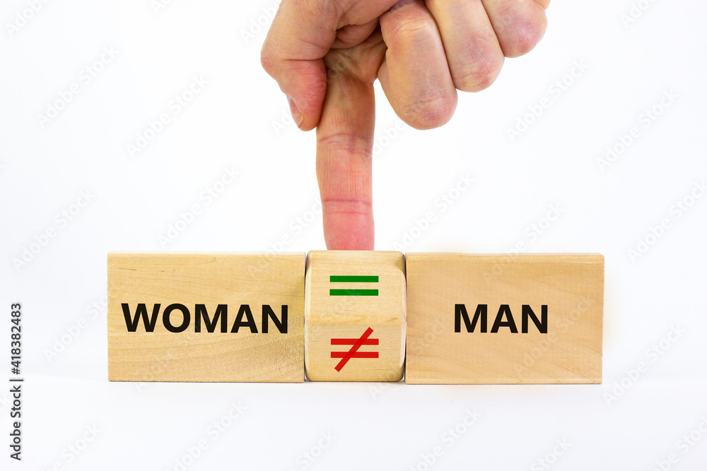Symbol for gender equality. Businessman turns a cube and changes a ...