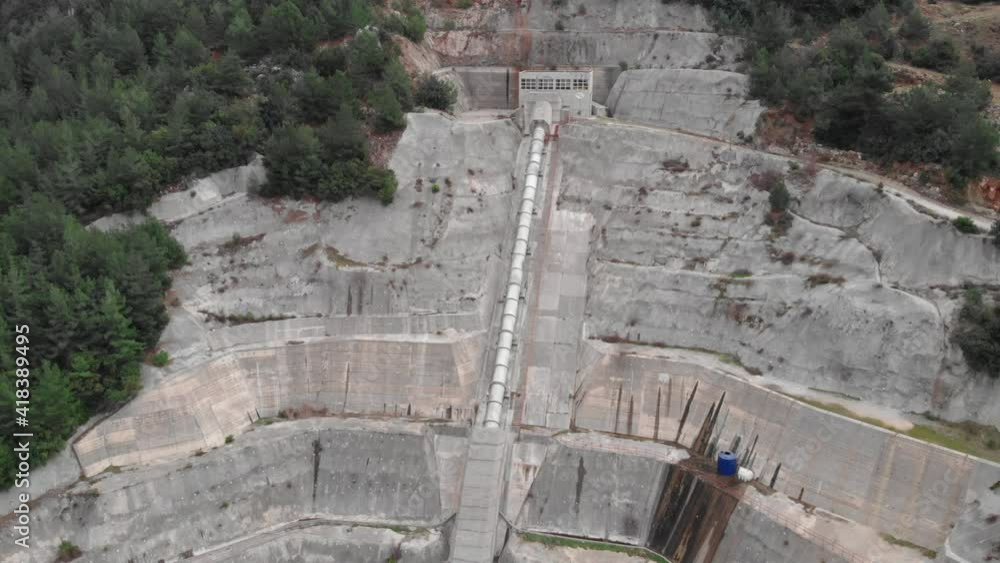 Stockvideon Pipeline of hydroelectric power station nestled under ...