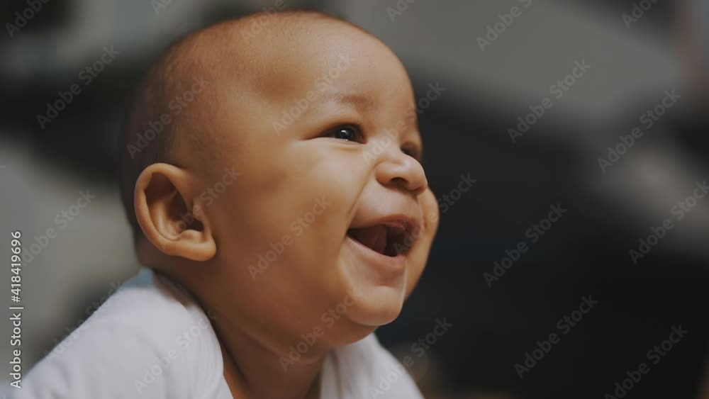 Portrait of adorable african american black baby. Baby laughing while ...