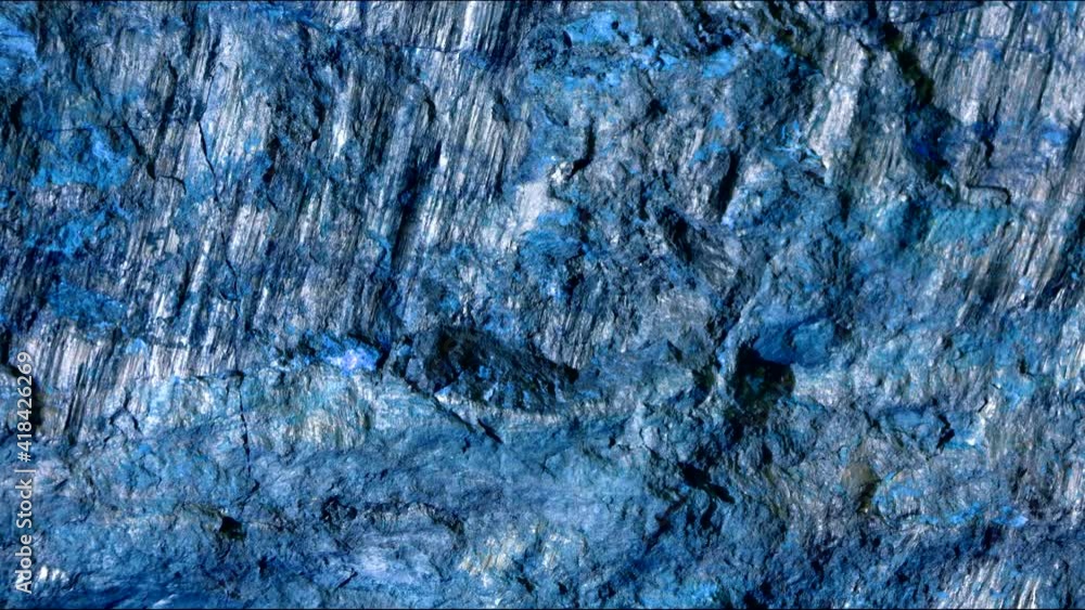 Bright blue metallic stone wall. Surface for design. Old vintage ...