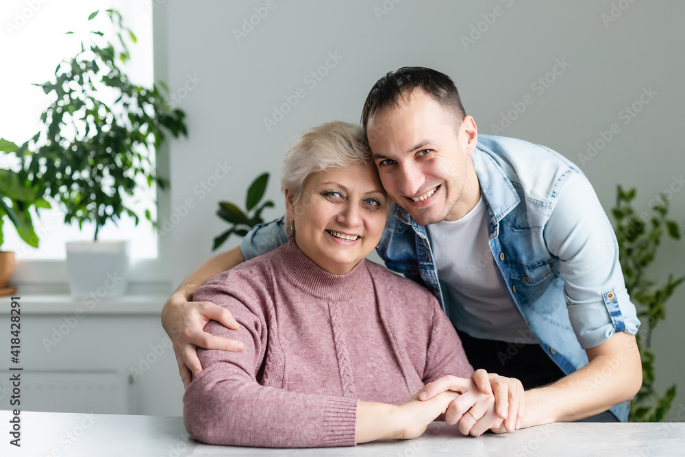Adult son and his aging mother Stock Photo | Adobe Stock