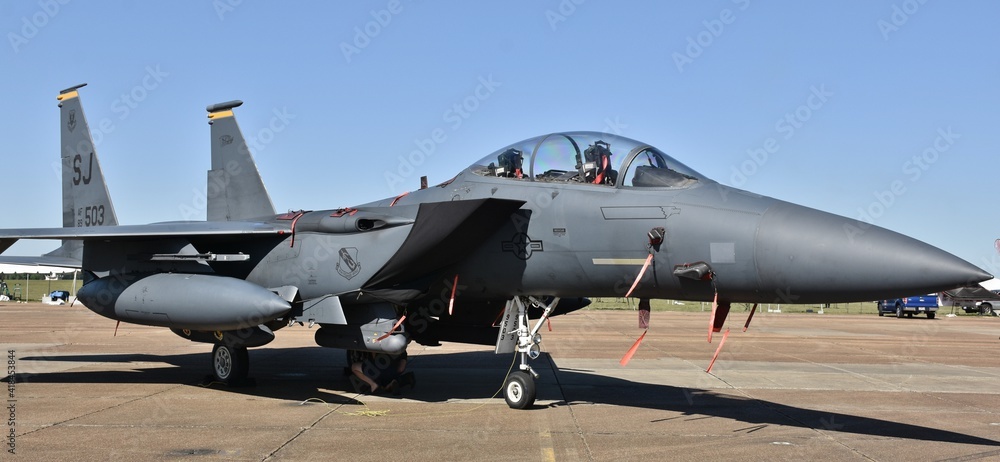 An Air Force F-15 Eagle fighter jet on a runway Stock Photo | Adobe Stock