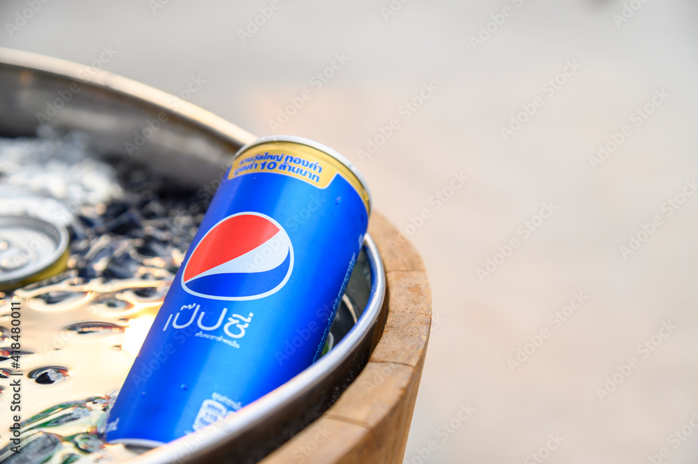 Pepsi Cola can and ice soft drink cans on ice in the bucket. Stock ...
