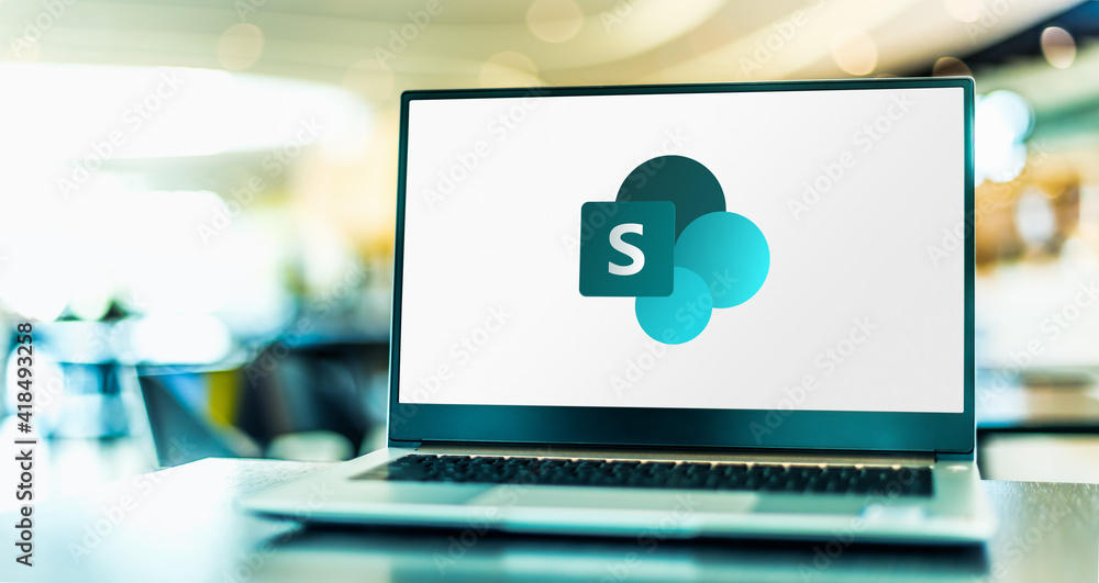 Laptop computer displaying logo of SharePoint Stock Photo | Adobe Stock
