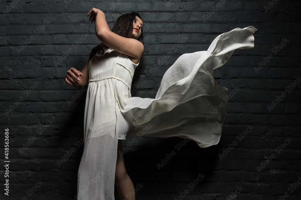 Indian girl, caucasian, brunette girl in white one leg cut gown with ...