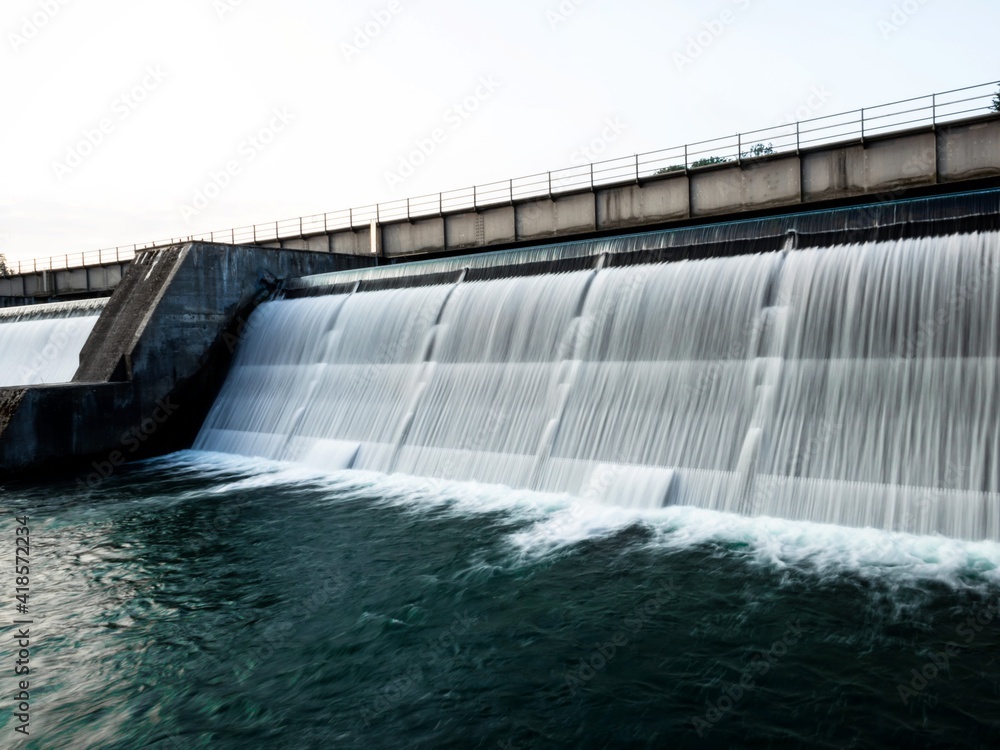 Long exposure of white waterfall dam sustainability renewable hydro ...