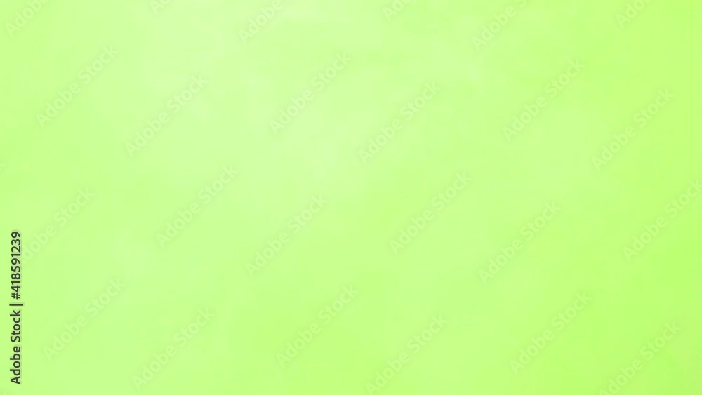 Green ink spreading in water on white. Abstract color background ...