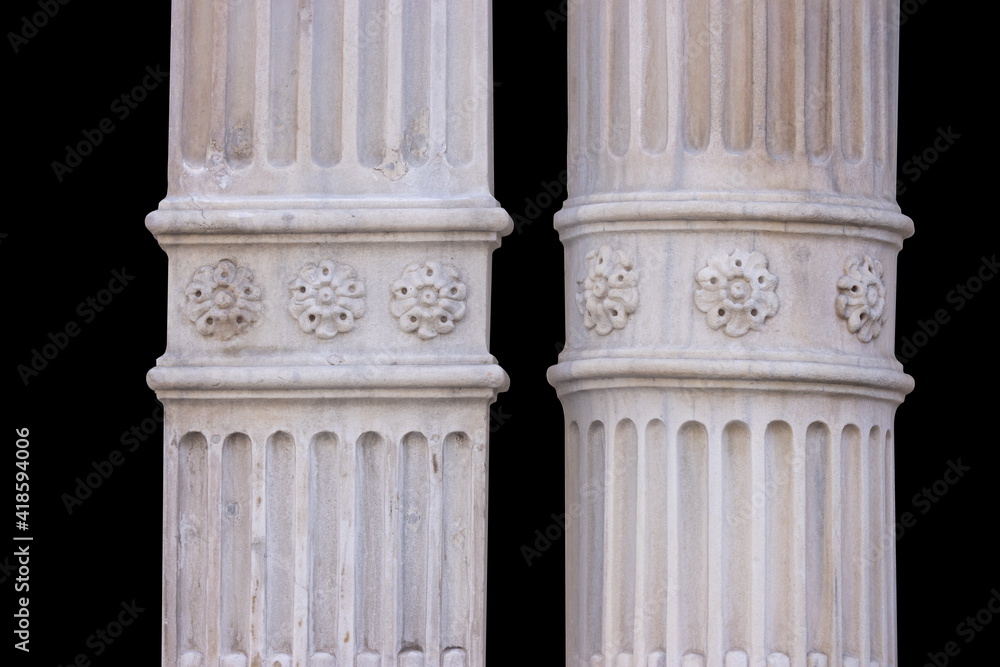 Elements of architectural decorations of buildings, old columns and ...