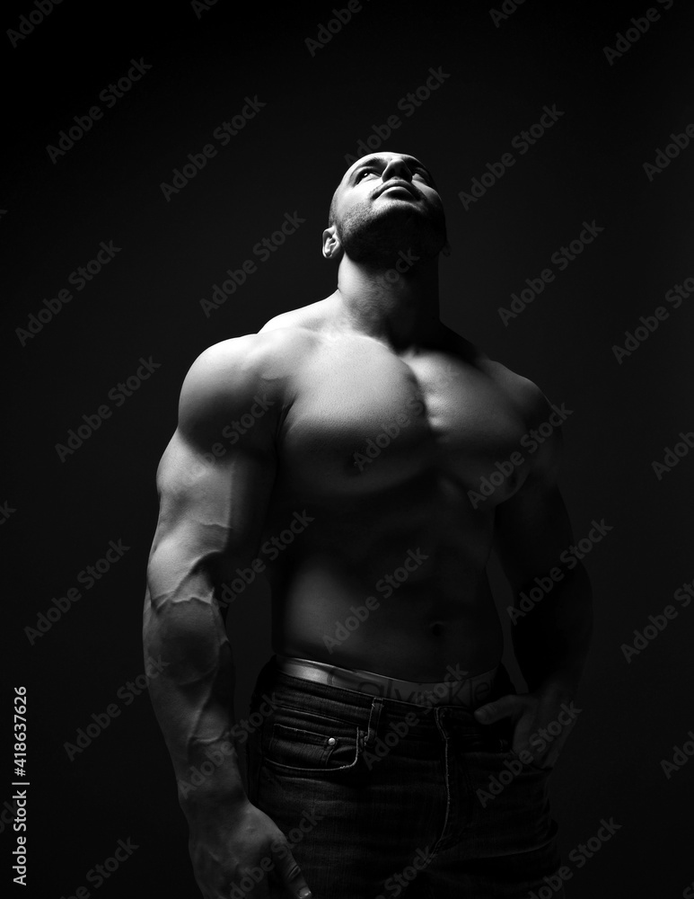 Black and white portrait of strong muscular man, sportsman, athlete ...