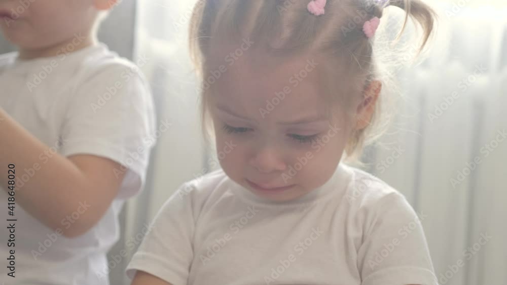 little girl a crying lifestyle upset tears. domestic violence concept ...