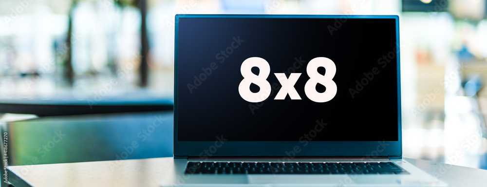 Laptop computer displaying logo of 8x8 Inc. Stock Photo | Adobe Stock