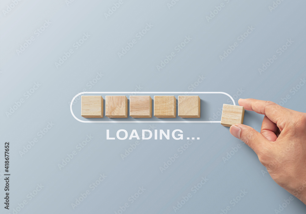 Loading, reboot, refresh or mindset concept. Hand putting wooden blocks ...