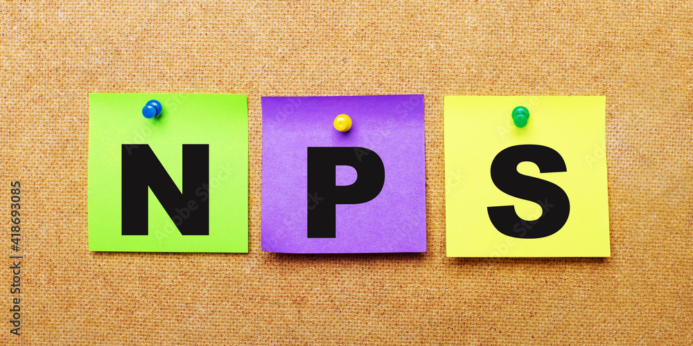 On a beige background, multi-colored stickers for notes with the word ...