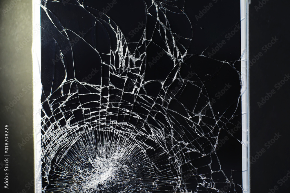 Crack on the glass. Broken screen. Broken phone. Cracked glass ...