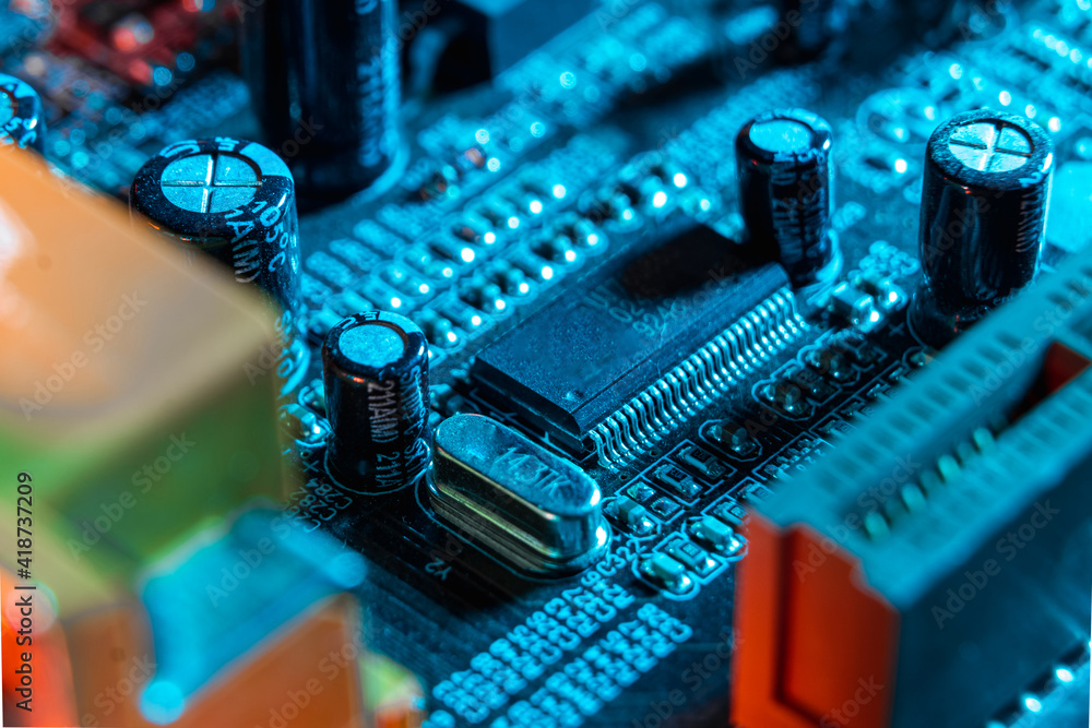 Electronic components on a printed circuit board. Resistor, inductor ...