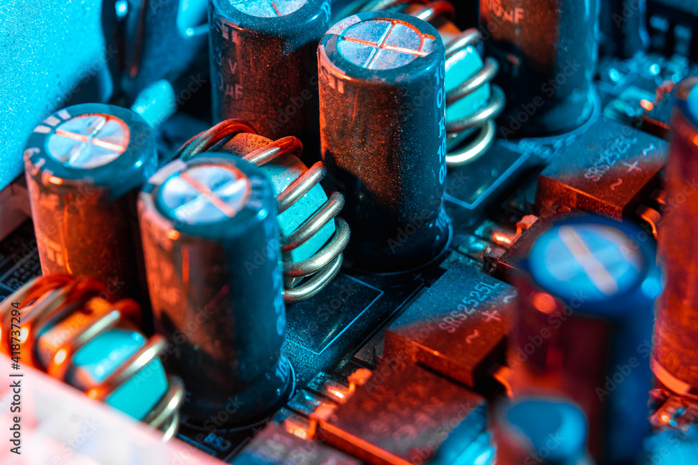Electronic components on a printed circuit board. Resistor, inductor ...