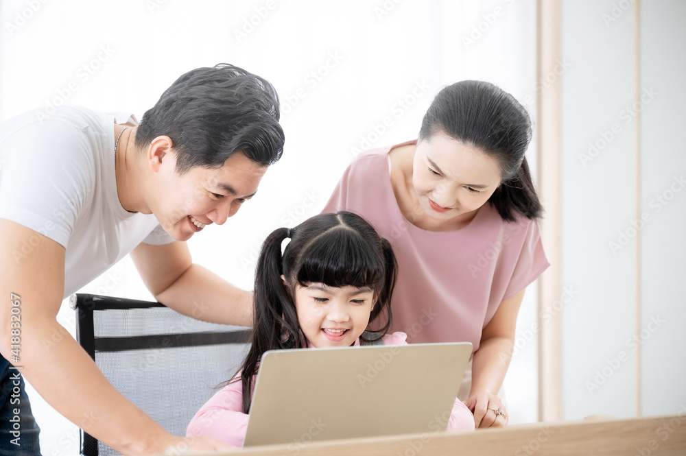 Asian girl student online learning class study using laptop and parent ...