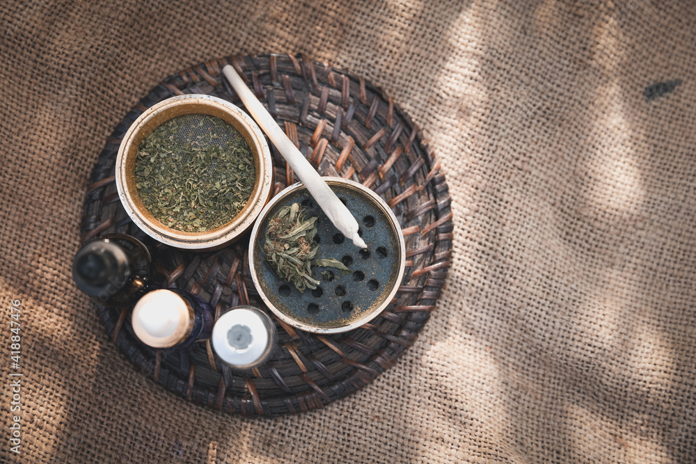 Preparing a joint and drug paraphernalia Stock Photo | Adobe Stock