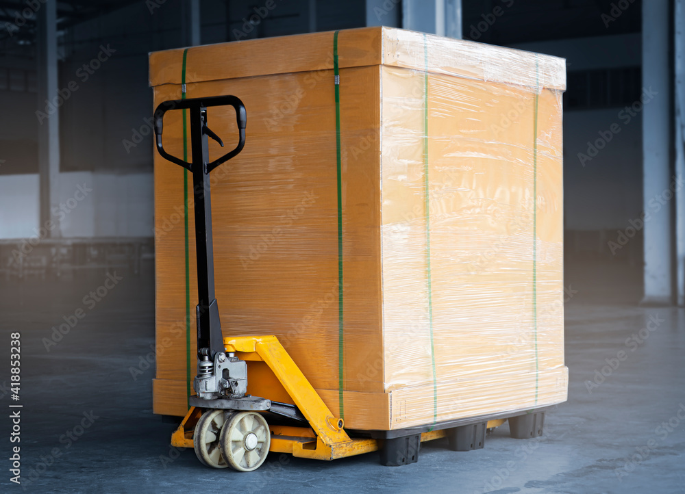 Cargo Pallet Boxes Wrapped Plastic on Pallet with Hand Pallet Truck ...