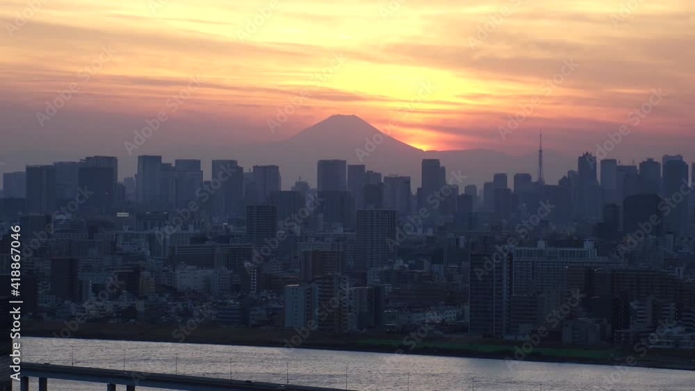 TOKYO, JAPAN : Aerial sunset CITYSCAPE of TOKYO and MOUNT FUJI. View of ...