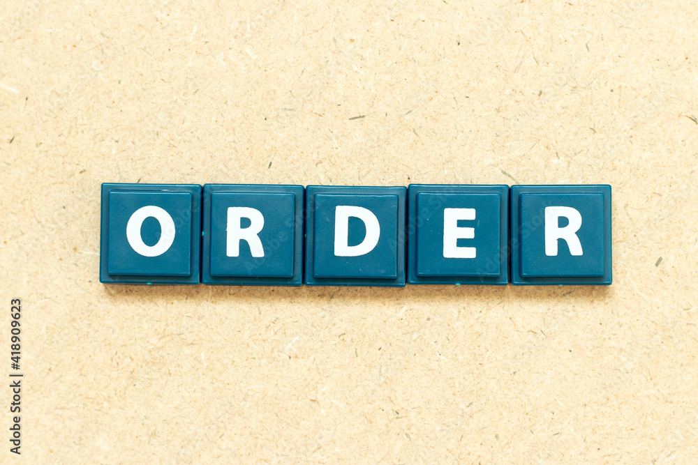 Tile alphabet letter in word order on wood background Stock-Foto ...