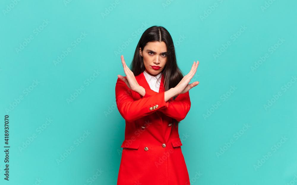 young pretty woman looking annoyed and sick of your attitude, saying ...