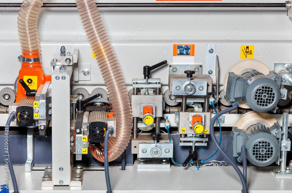 The internal structure of a modern woodworking machine with a sawdust ...