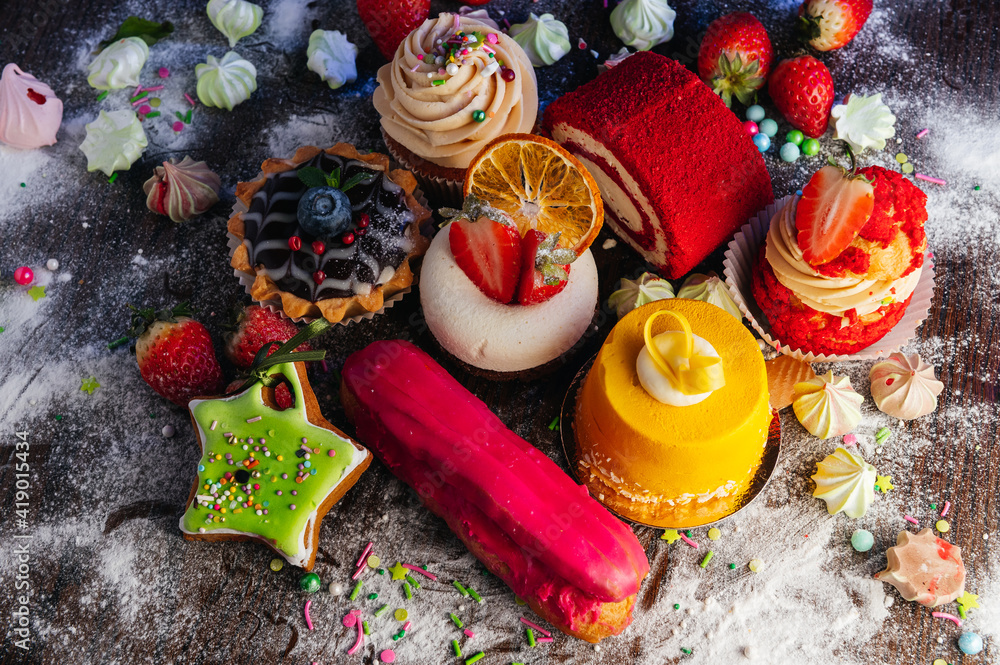 Variety of delicious confectionery products. A mix of chocolate mousse ...