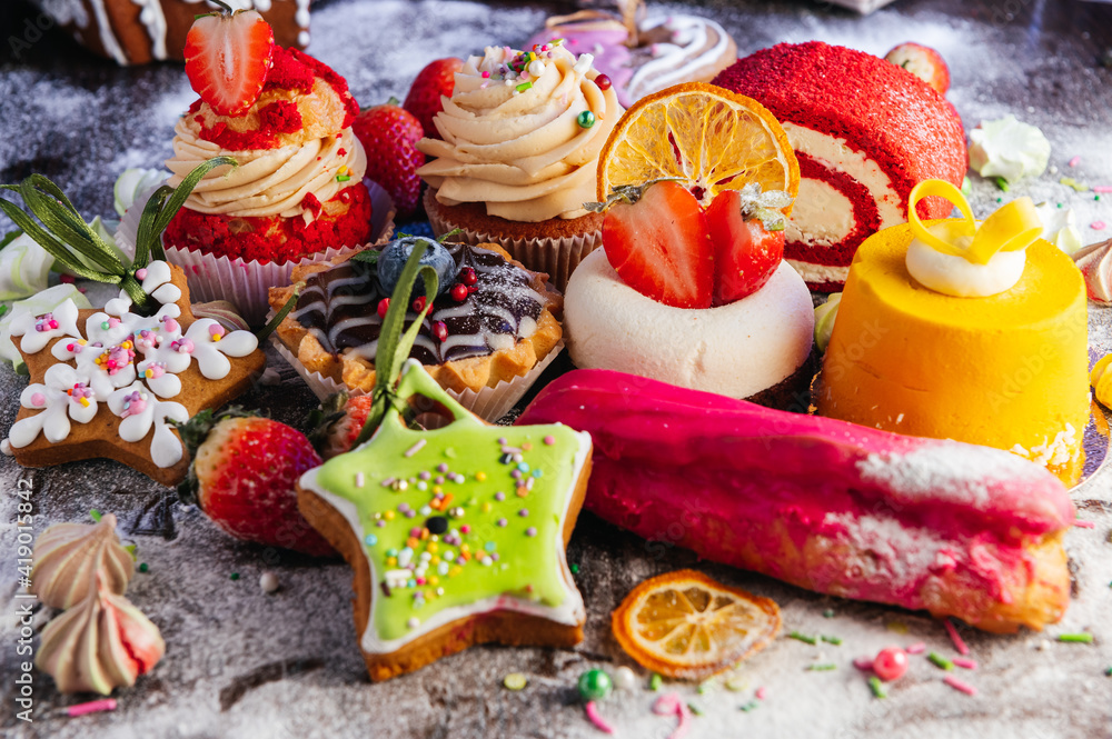 Variety of delicious confectionery products. A mix of chocolate mousse ...