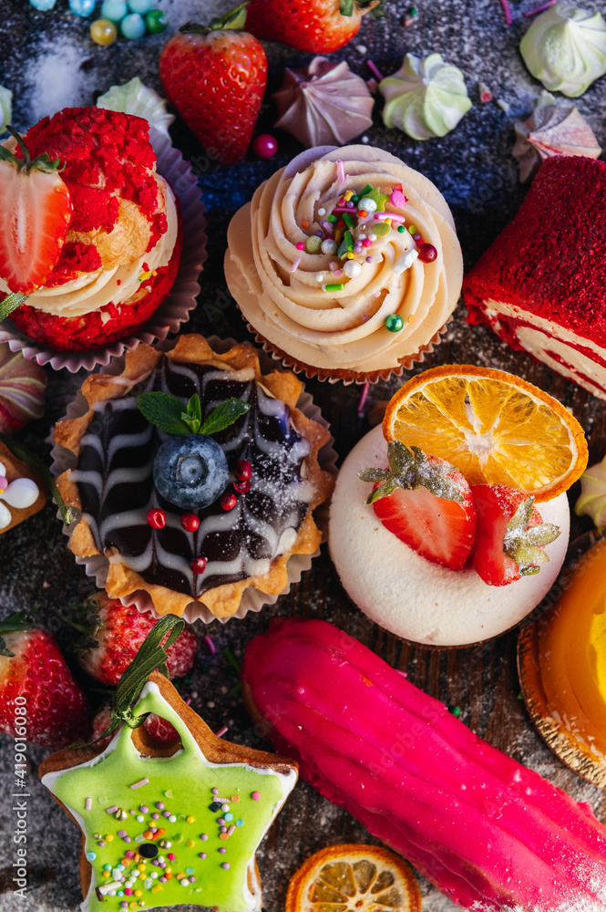 Variety of delicious confectionery products. A mix of chocolate mousse ...