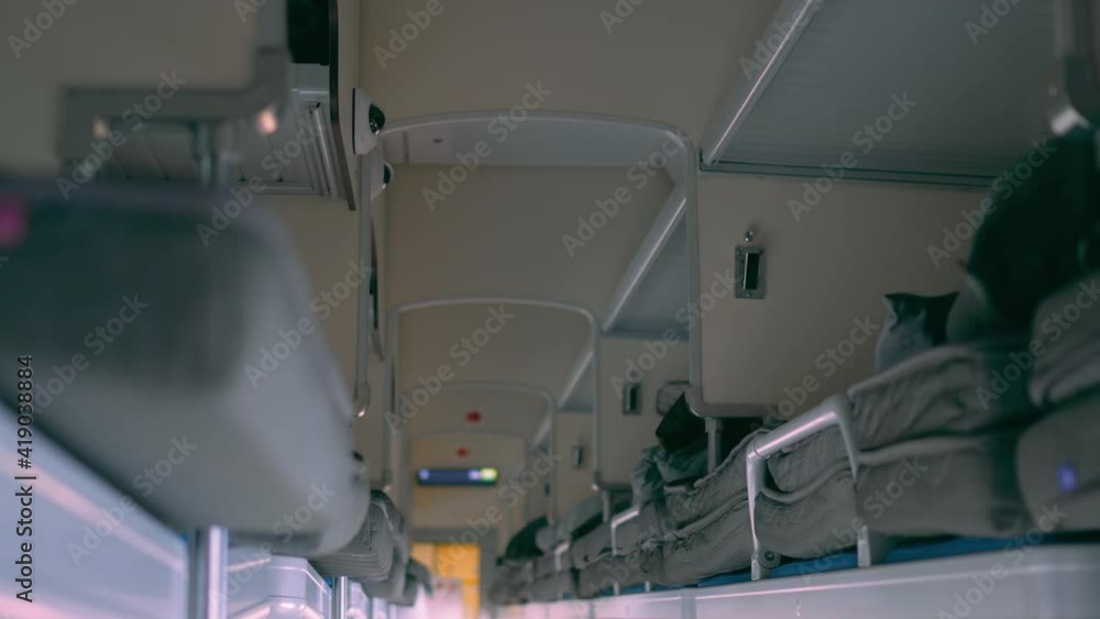 The second-class cabin of a passenger train without passengers ...
