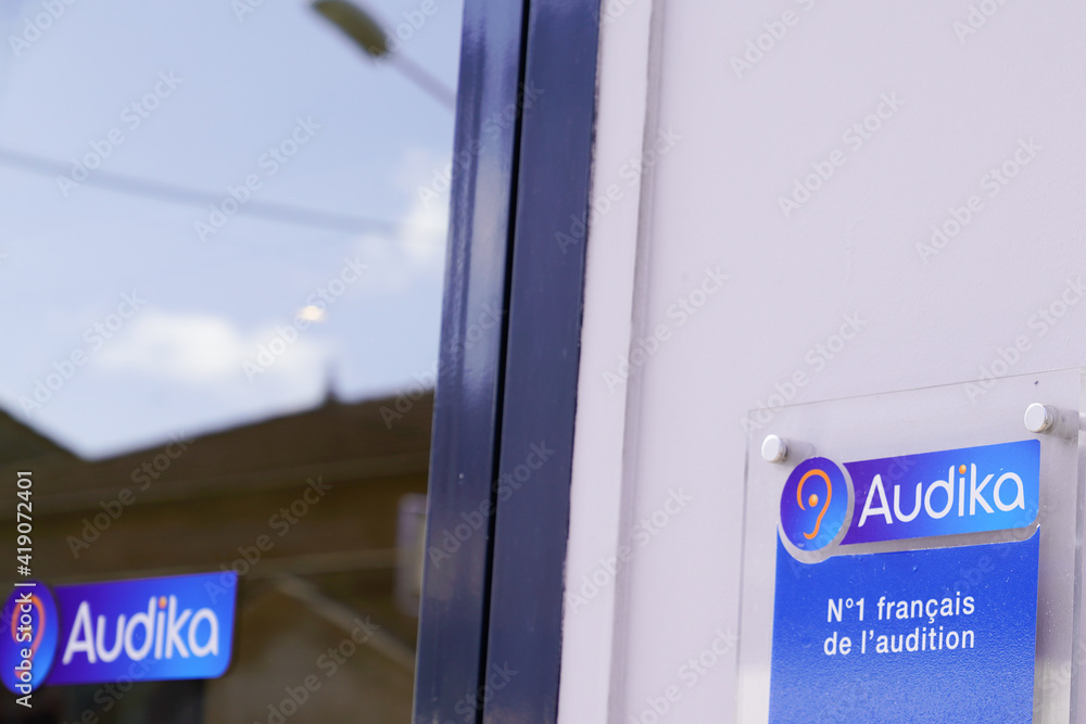 audika logo sign and text brand front of store agency hearing medical ...