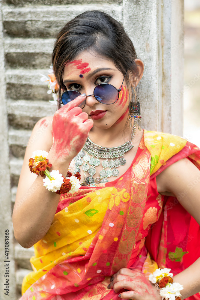 Portrait of pretty young indian girl wearing traditional saree and ...