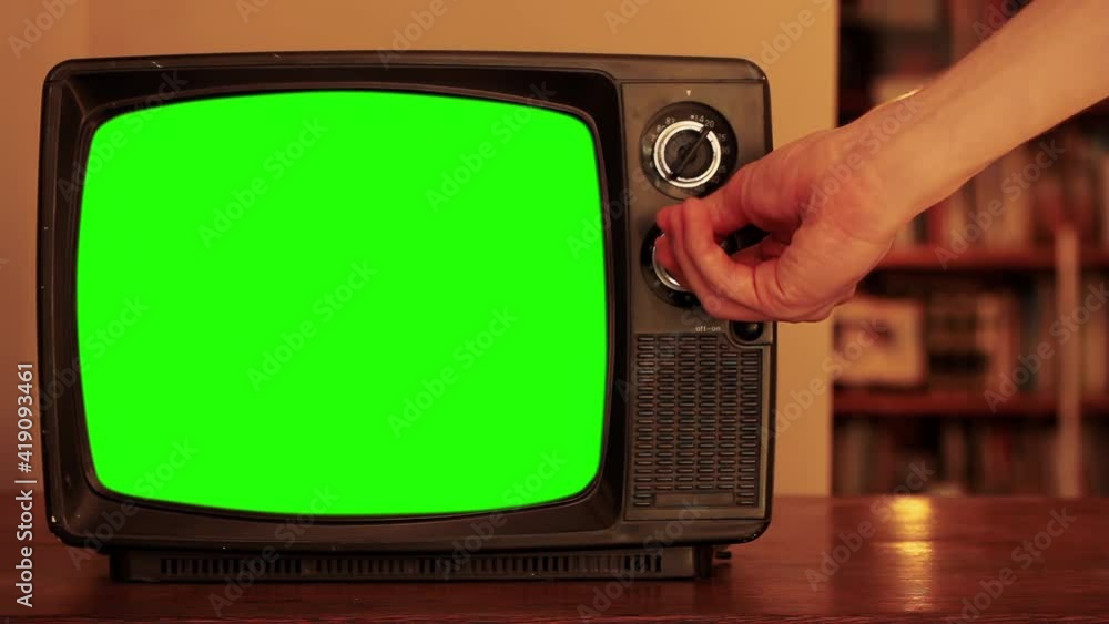 Vintage Television Tuning: Hand Moving Dials on Old TV with Green ...