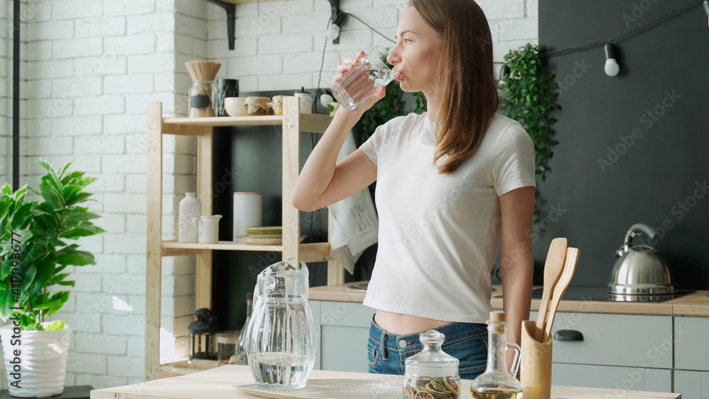 Woman Drinking Water Kitchen
