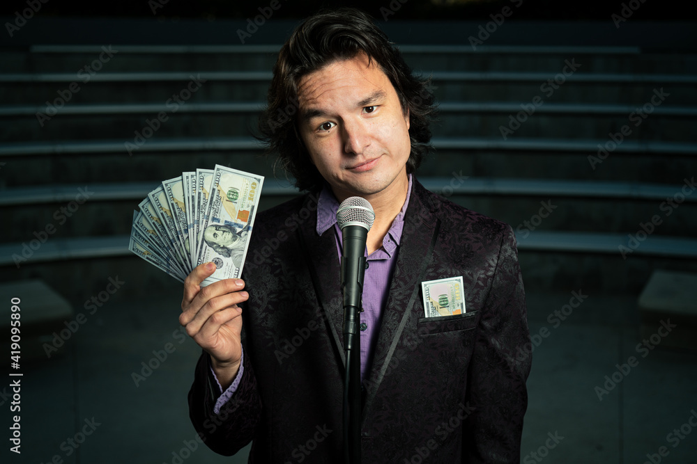 Male Asian Stand Up Comedian with Microphone and Fanned $100 Dollar ...