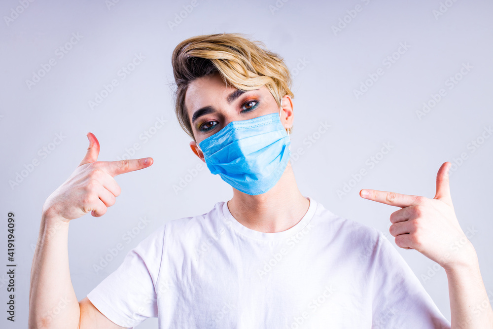 non binary portrait of asian man with luxurious blonde hair and ...