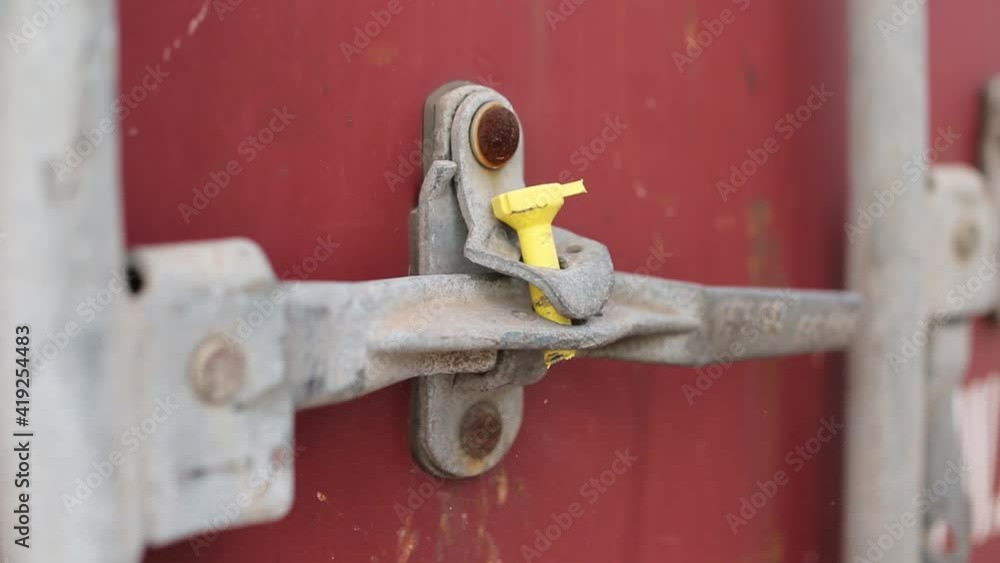 opening the seal of the container in the port. Containers opened ...