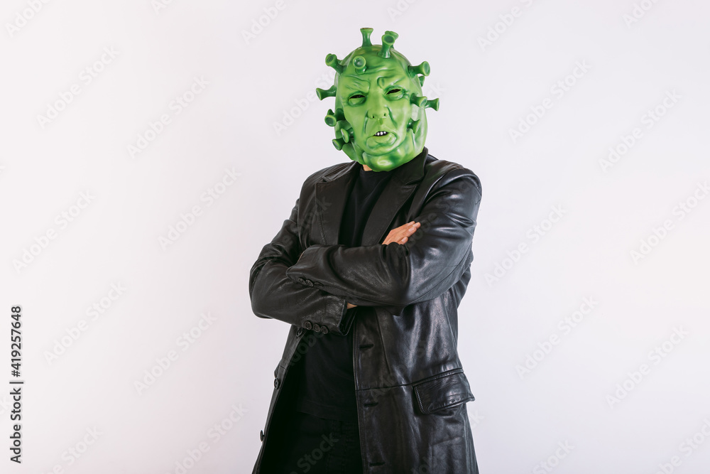 Person disguised as coronavirus with latex mask - covid-19 virus ...