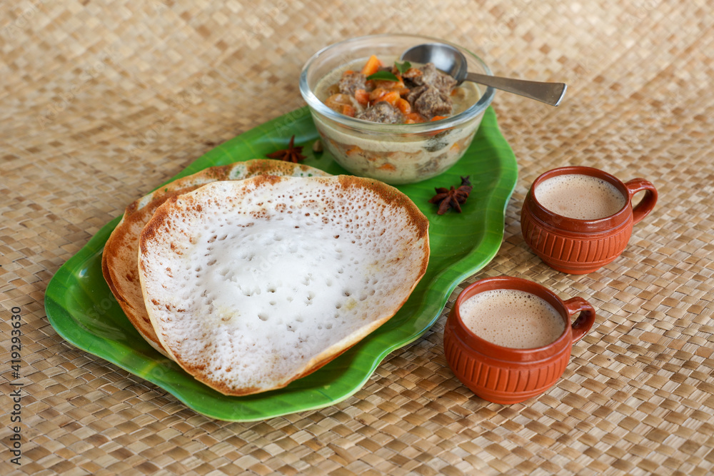 Appam, Hoppers and mutton stew Kerala breakfast food and Indian milk ...