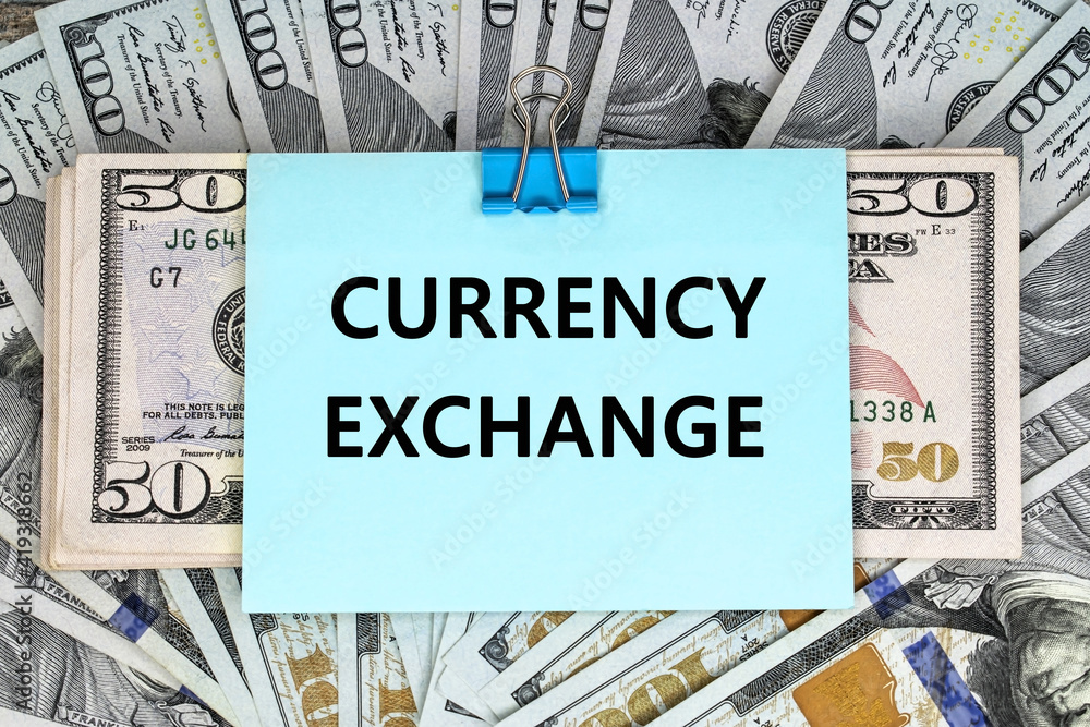 The inscription in black letters on a blue sheet of currency exchange ...