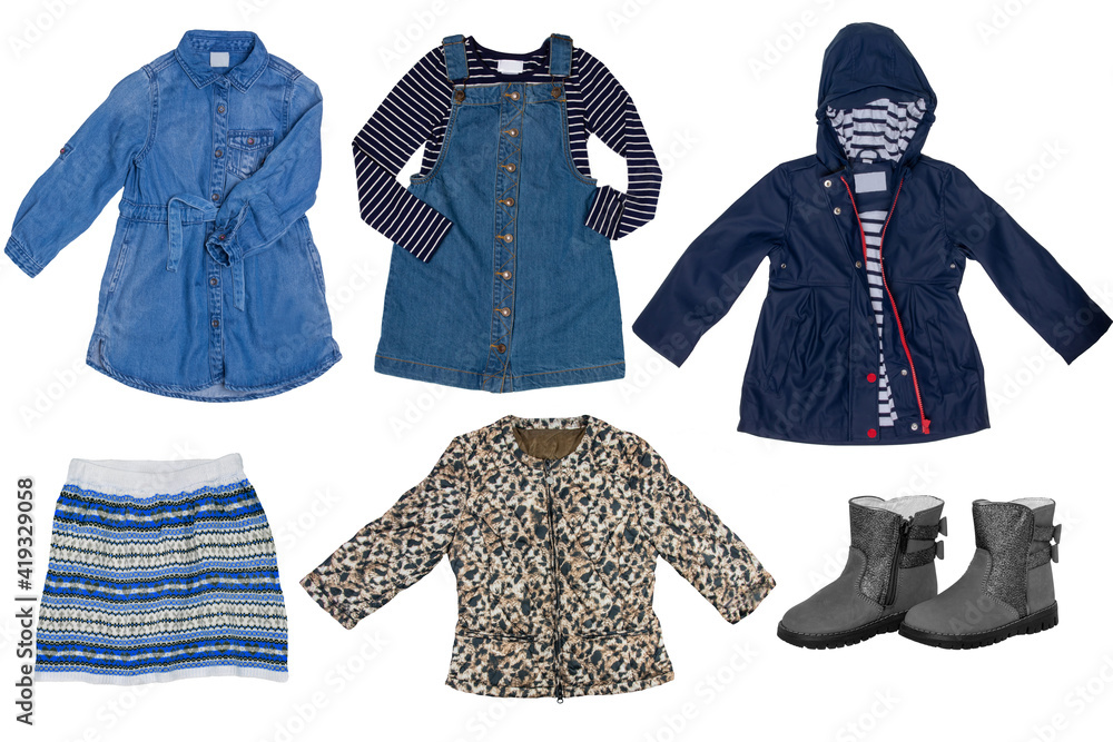 Collage set of little girl clothes isolated on a white background. The ...