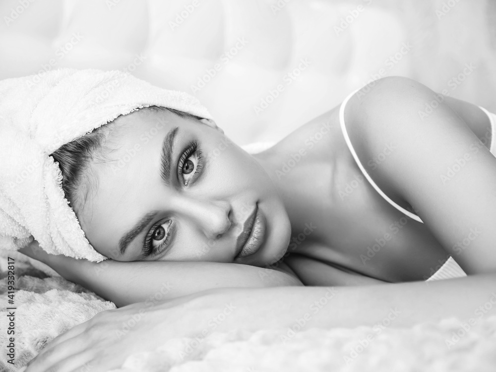 Portrait Of Young Beautiful Female In White Lingerie And Towel On Head