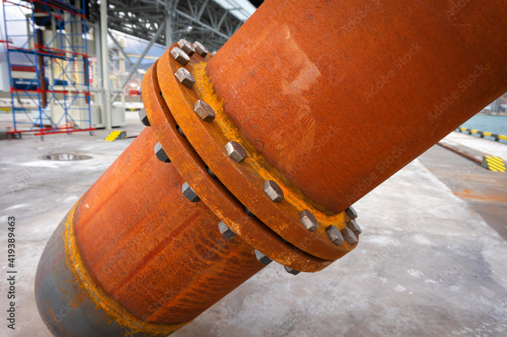 rusted large metal pipe with bolted connection Stock Photo | Adobe Stock