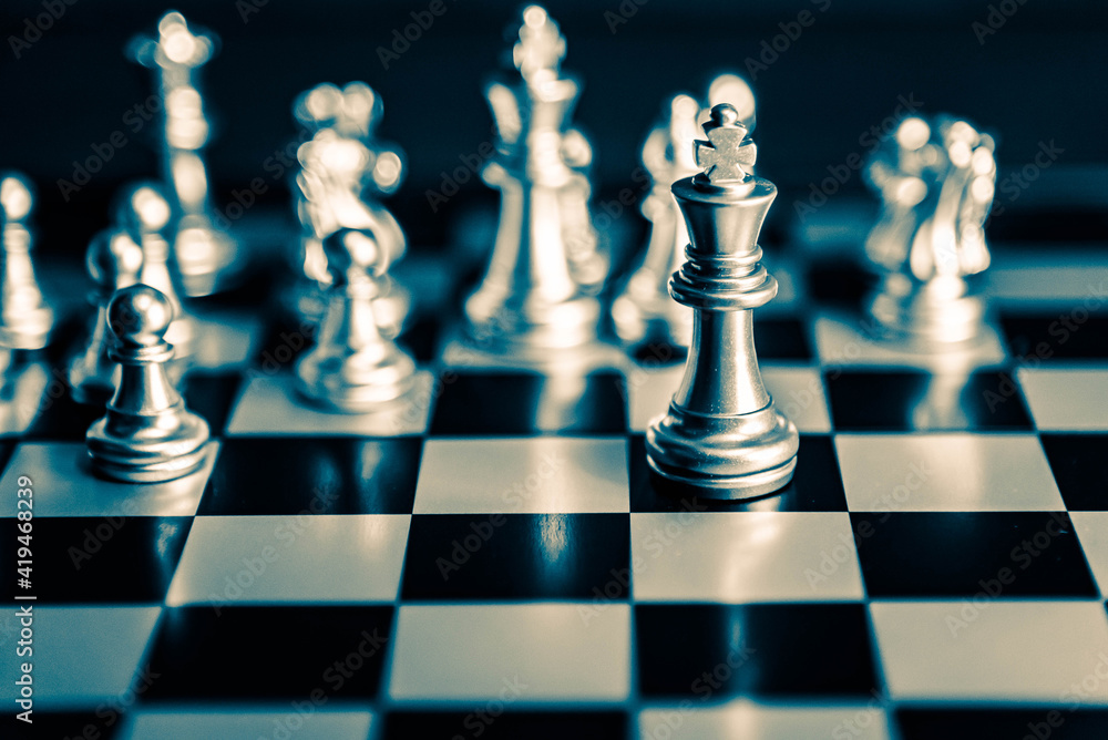 Chess board game to represent the business strategy with competition in ...