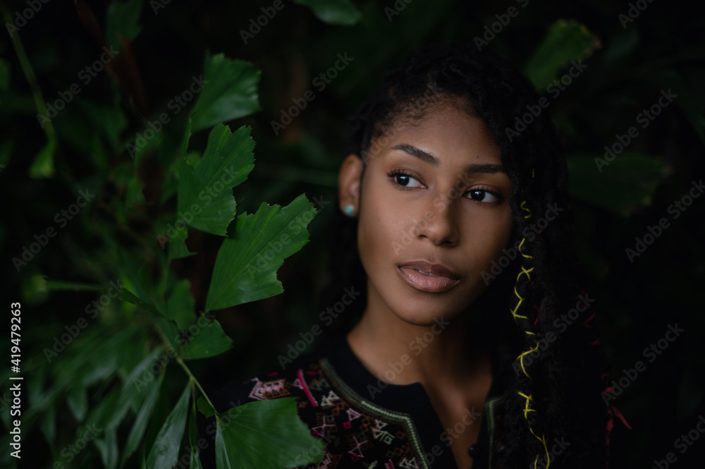 Intimate portrait of attractive afro latina woman half covered by ...