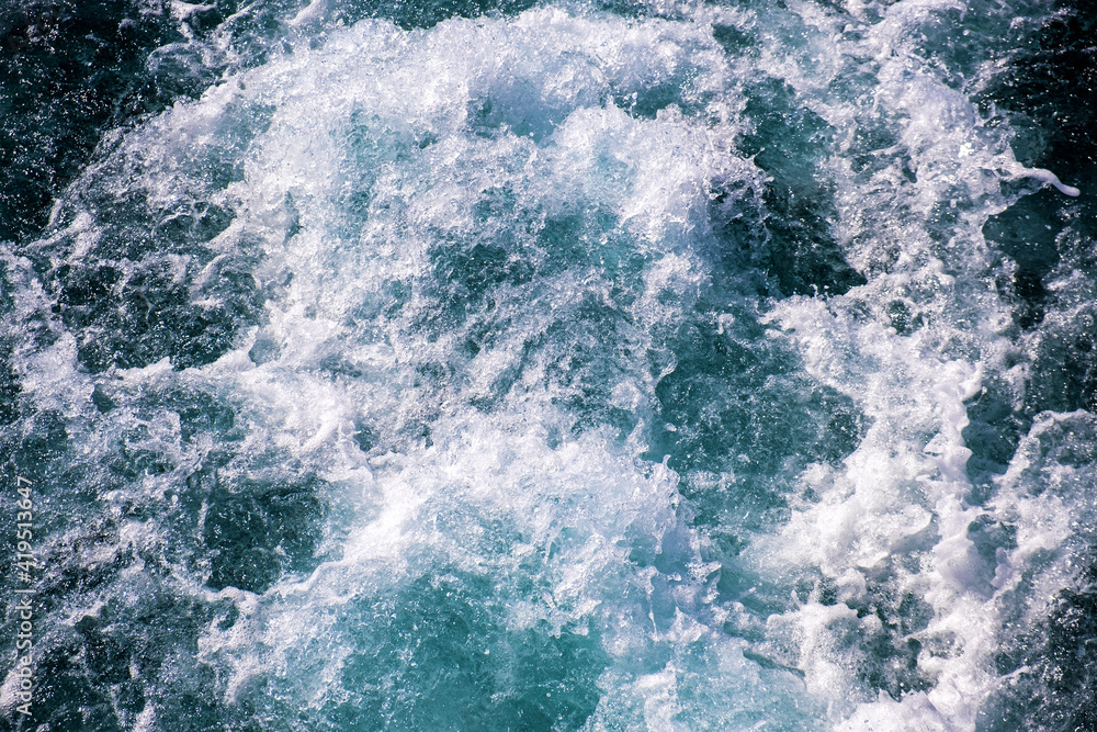 Top down aerial view of sea water surface. White foam waves texture as ...